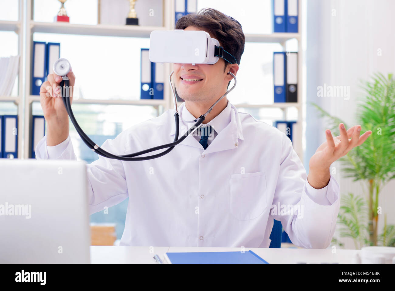 Doctor working with virtual VR reality glasses Stock Photo - Alamy
