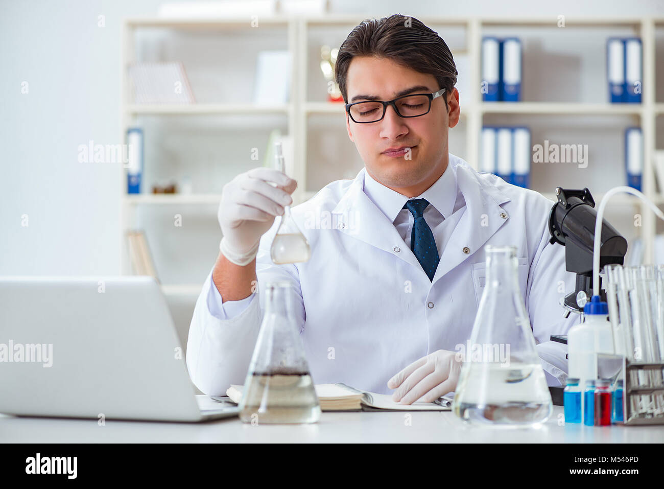 Young researcher scientist doing a water test contamination expe Stock ...