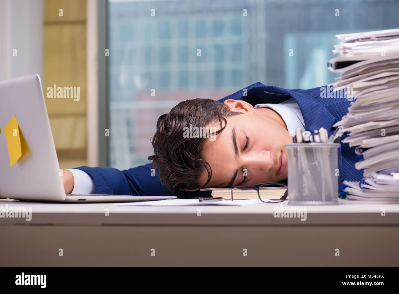Workaholic businessman overworked with too much work in office Stock ...