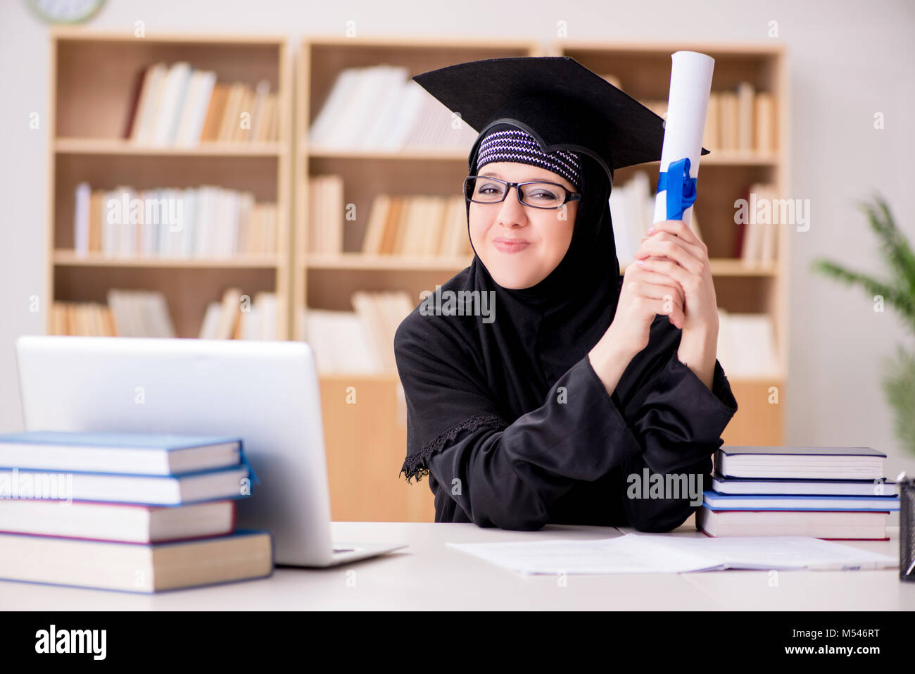 Muslim girl in hijab studying preparing for exams Stock Photo - Alamy