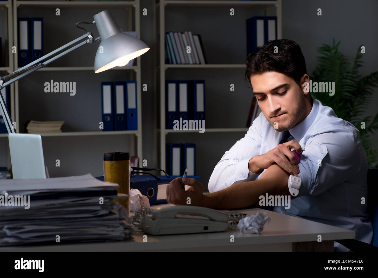 Employee relieving stress from overtime with drugs narcotics Stock ...