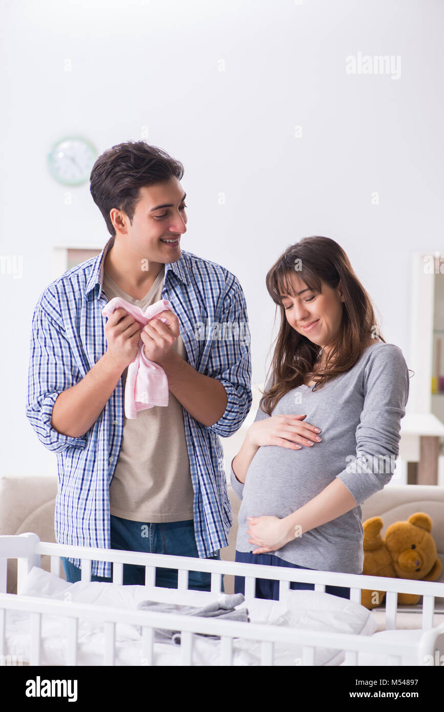 Young parents expecting their first baby Stock Photo - Alamy