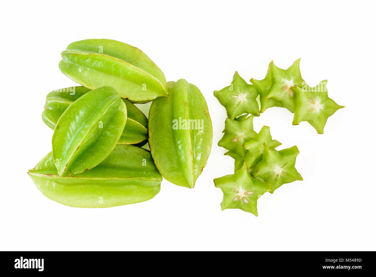 Star fruit or carambola (whole and sliced) on white background Stock ...