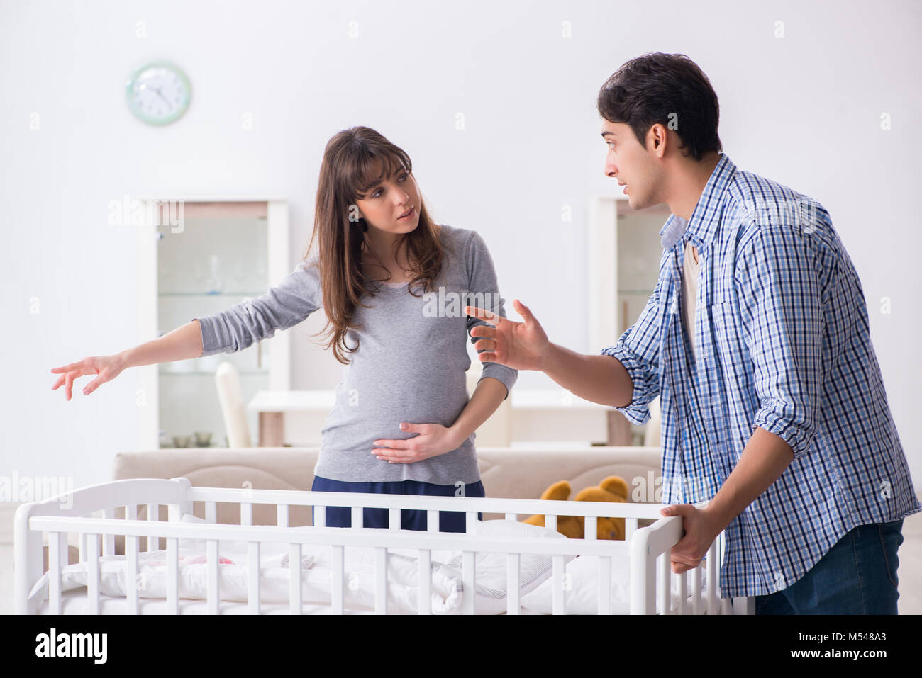 Young parents expecting their first baby Stock Photo - Alamy