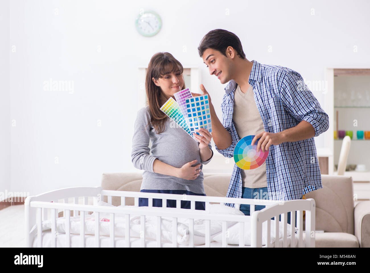 Young parents expecting their first baby Stock Photo - Alamy