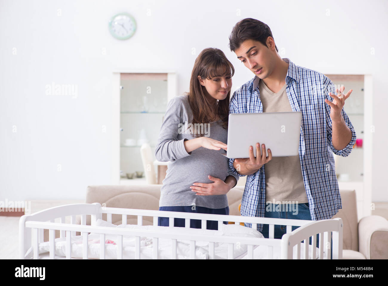 Young parents expecting their first baby Stock Photo - Alamy