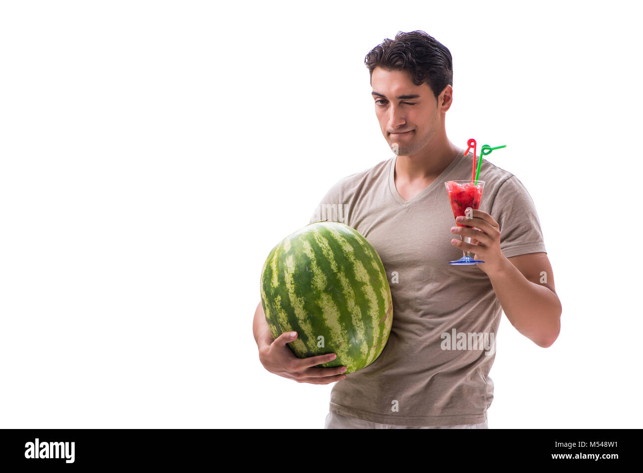 Young man with watermelon isolated on white Stock Photo - Alamy