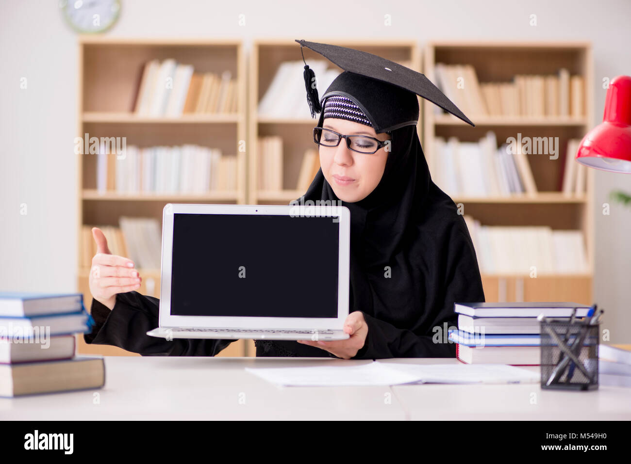 Muslim girl in hijab studying preparing for exams Stock Photo - Alamy