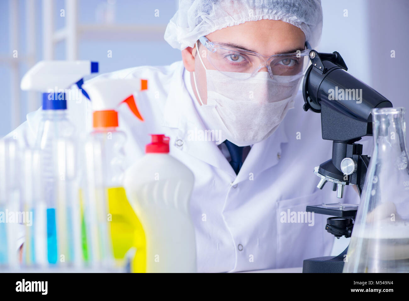 Man in the lab testing new cleaning solution detergent Stock Photo - Alamy