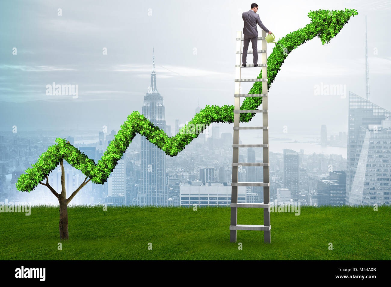 Businessman in investment concept watering financial line chart Stock ...