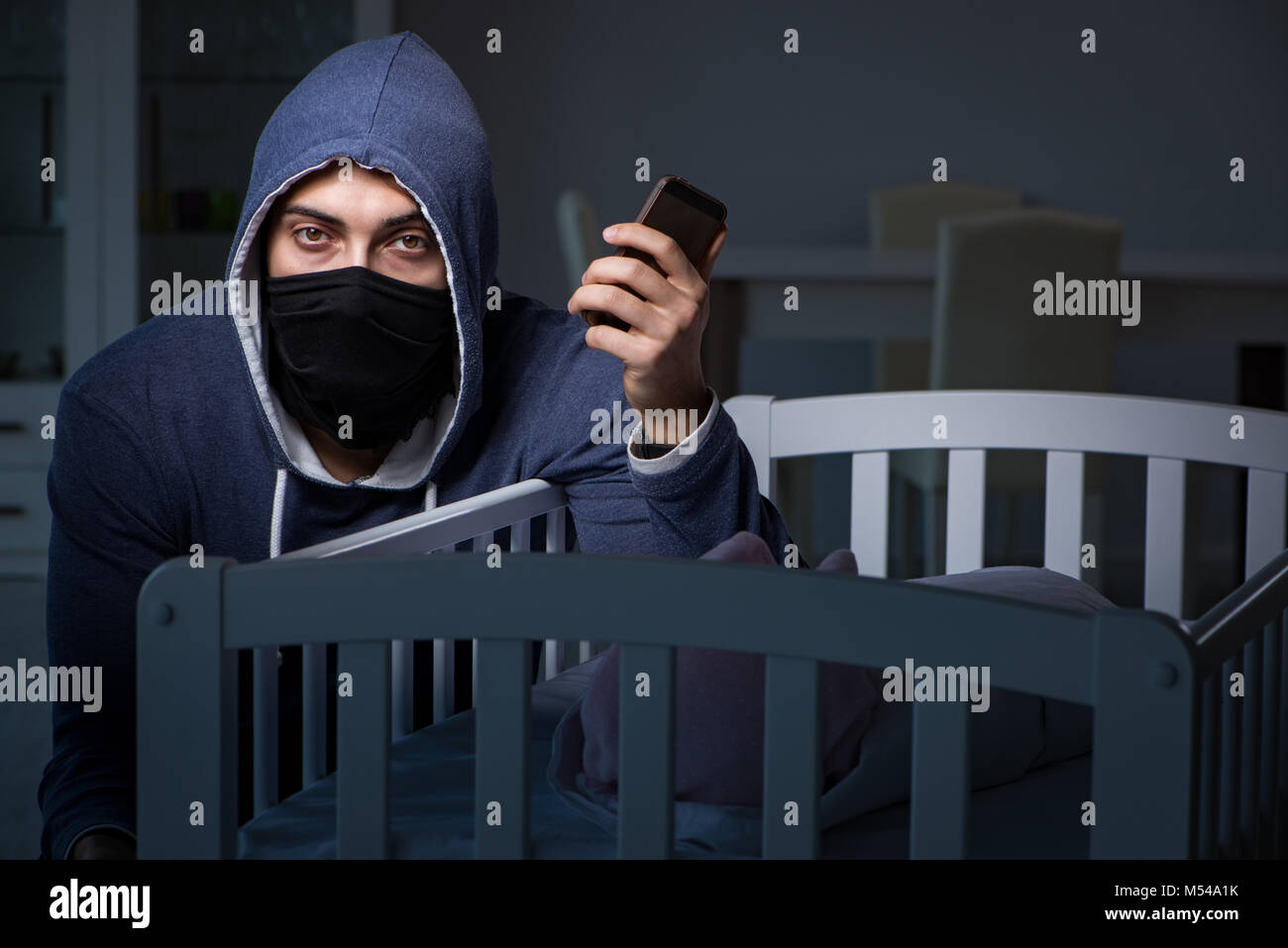 Child with phone in bed, dark hi-res stock photography and images - Alamy