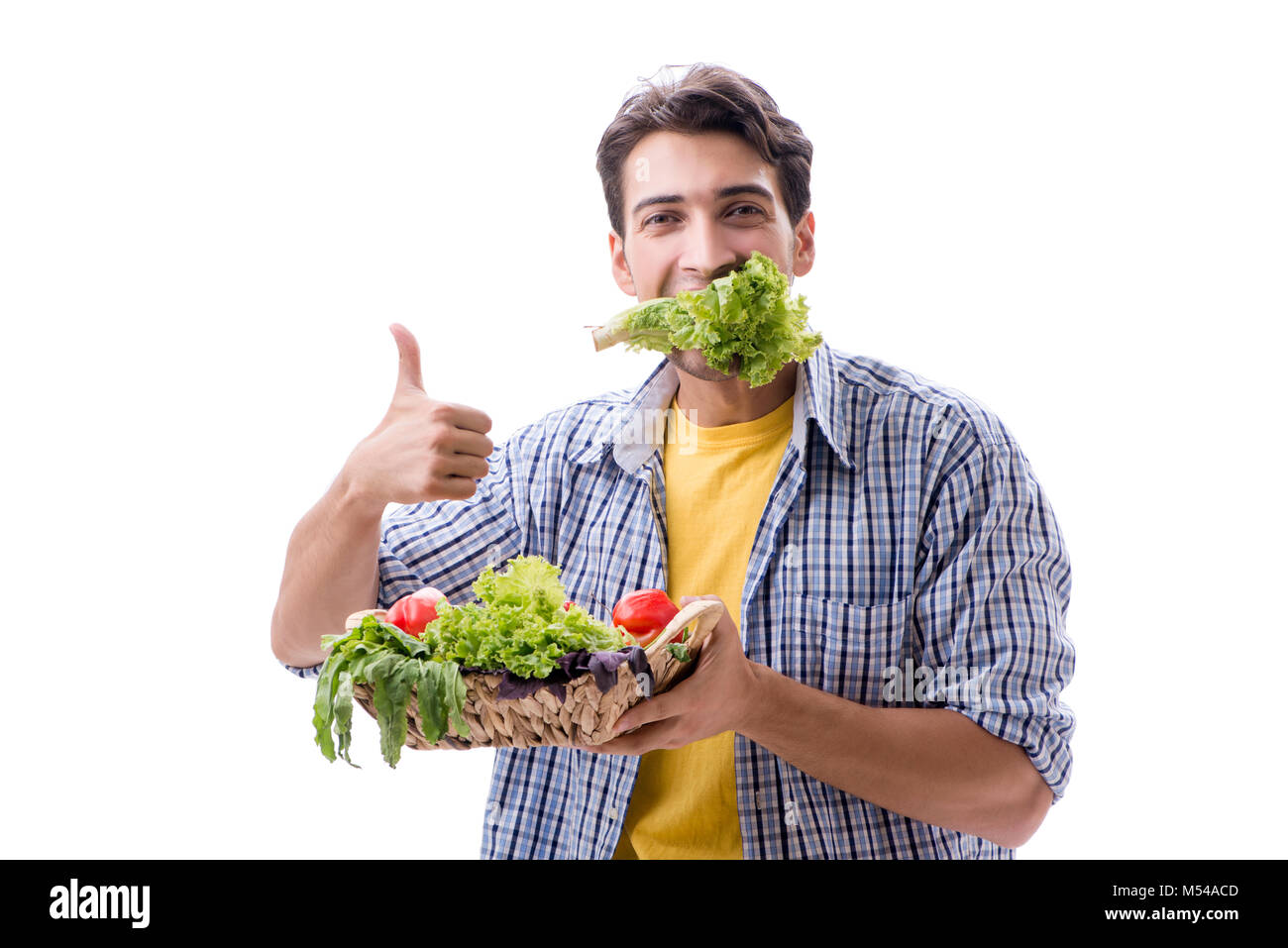 Man with basket of fruits and vegetables Stock Photo - Alamy