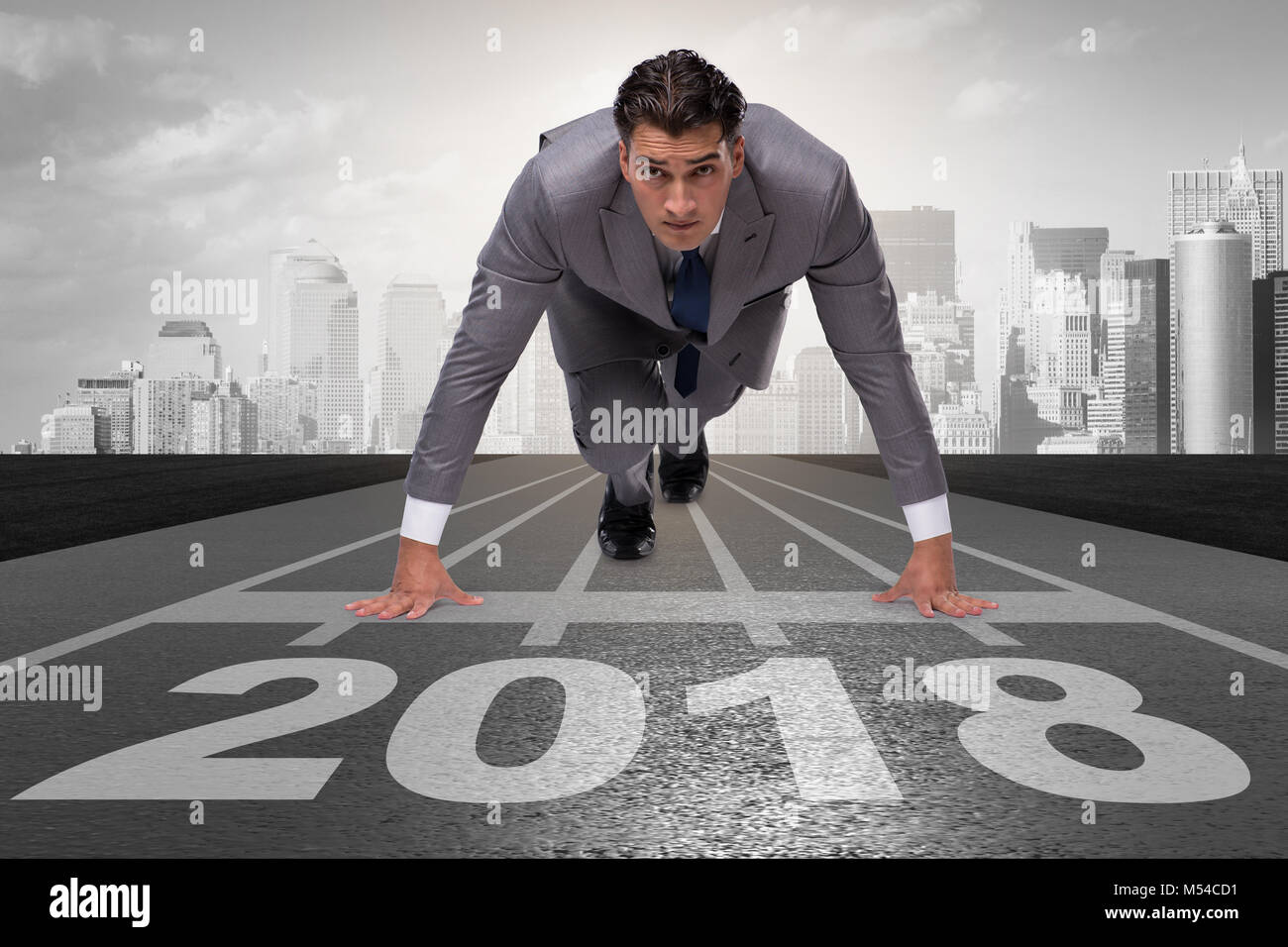 Businessman running towards new year 2018 Stock Photo - Alamy