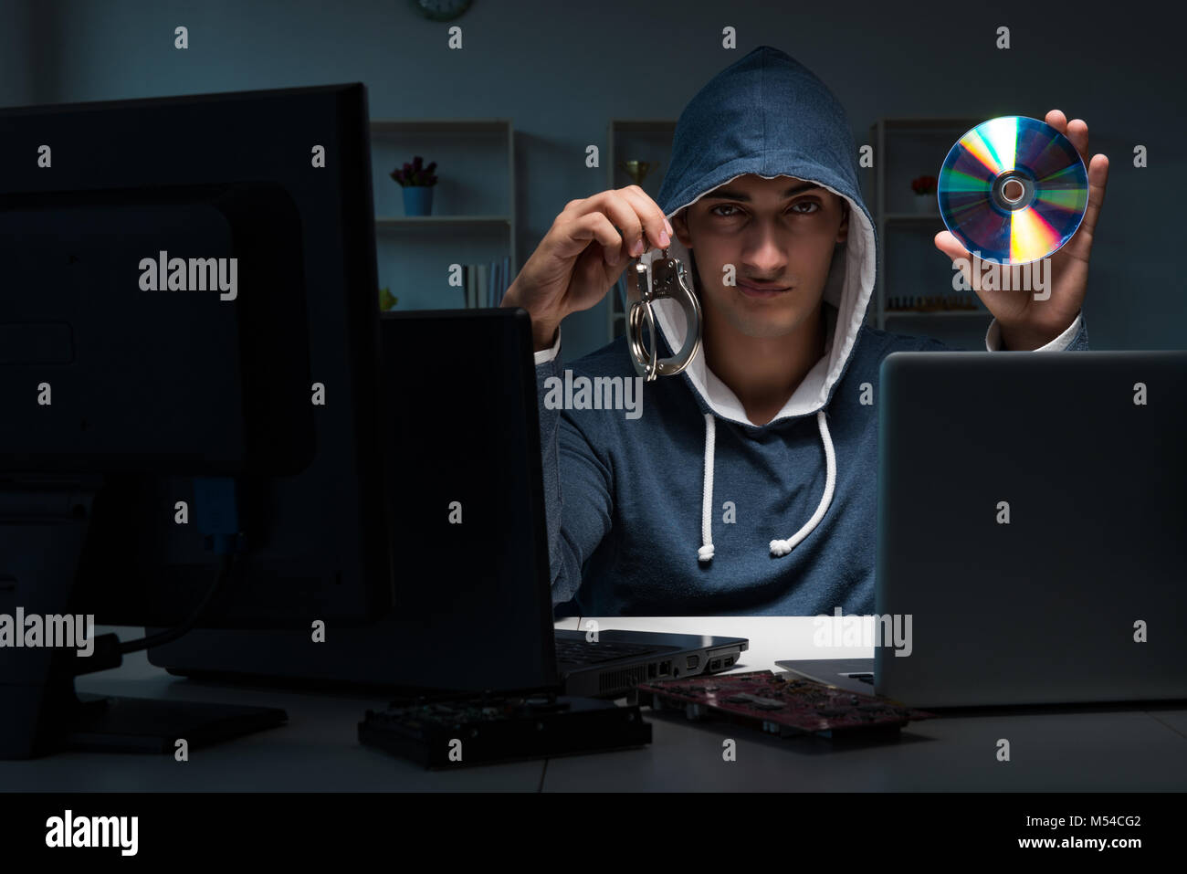 Hacker hacking computer at night Stock Photo - Alamy