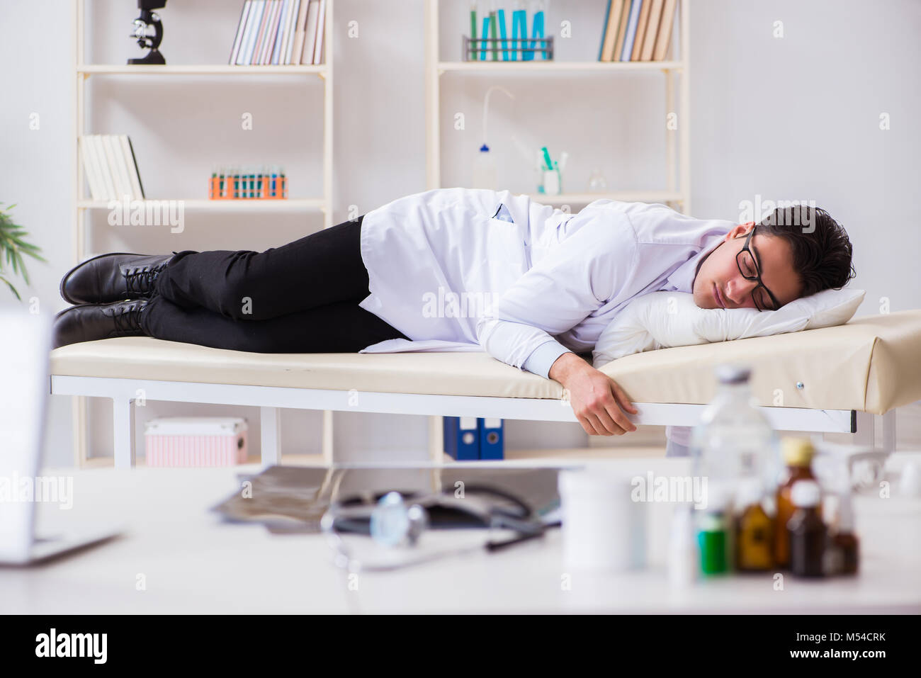 Doctor relaxing after complex surgery in hospital Stock Photo - Alamy