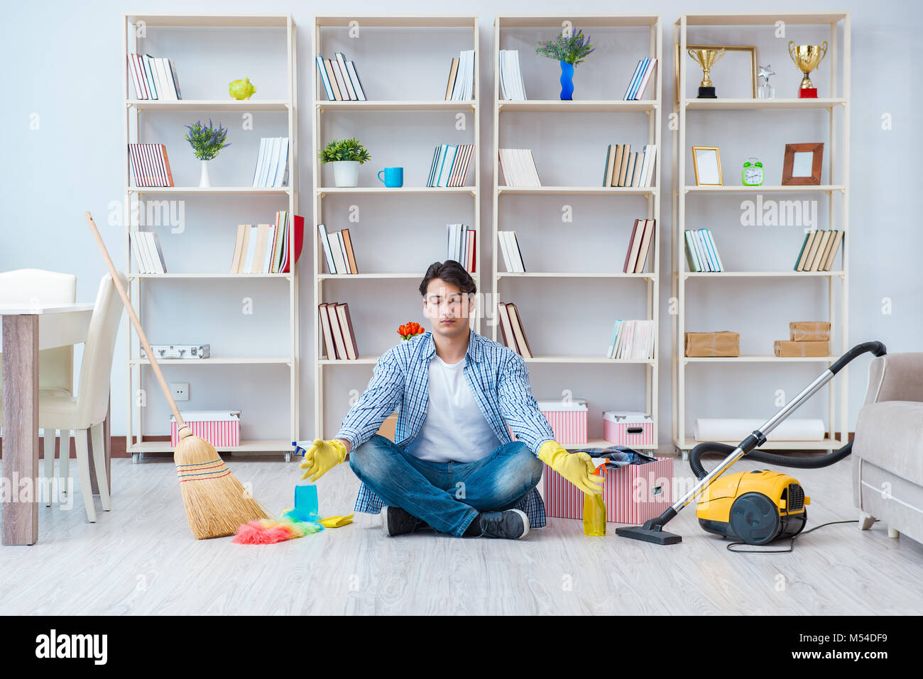 Man doing cleaning at home Stock Photo - Alamy