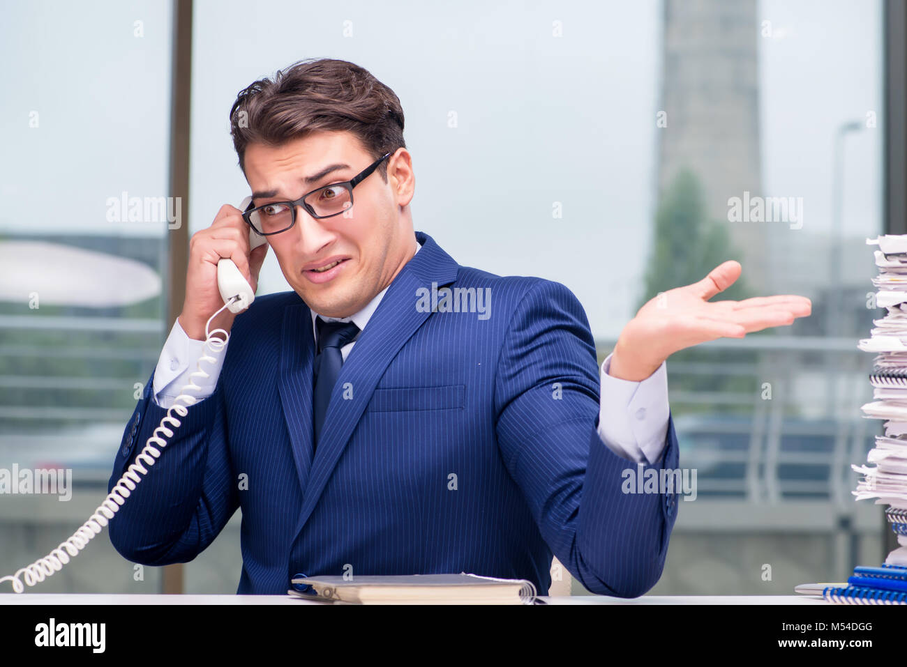 Angry call center employee yelling at customer Stock Photo - Alamy