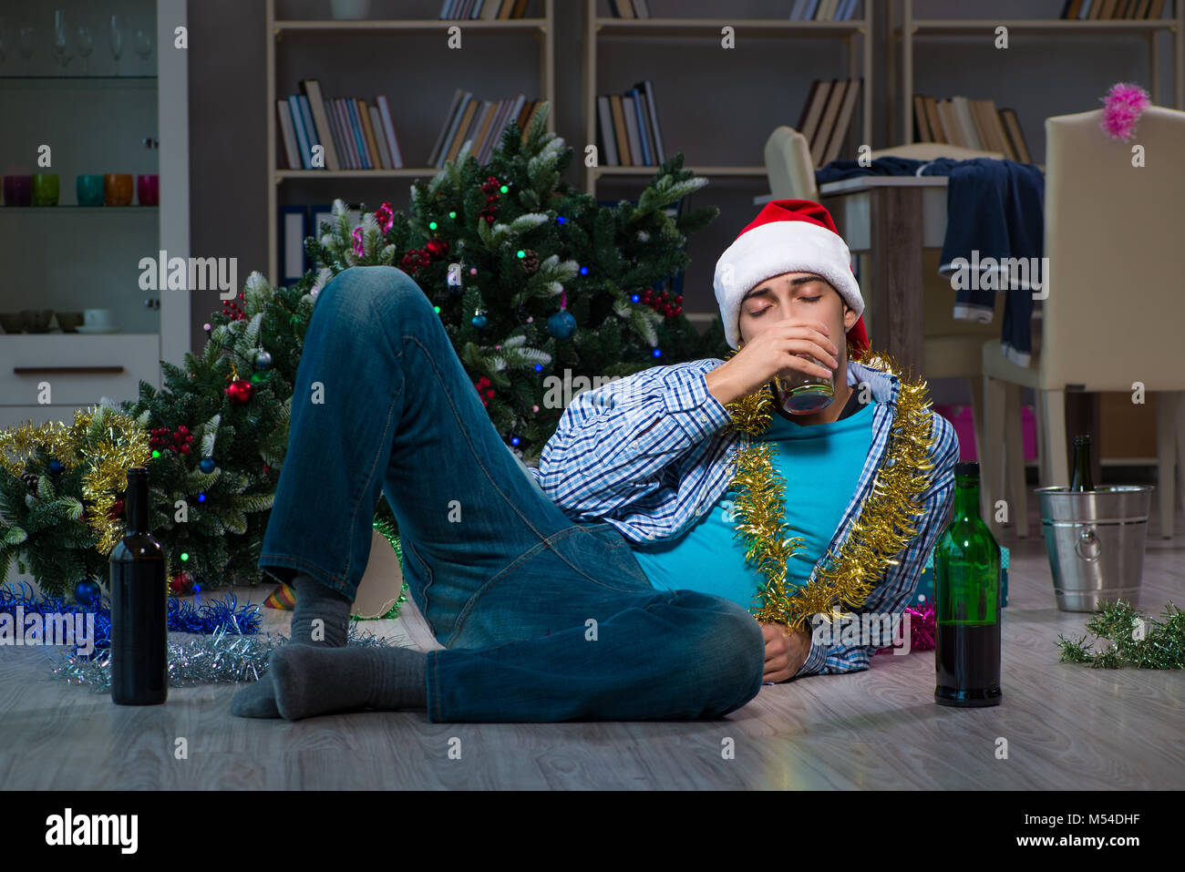 Man celebrating christmas at home alone Stock Photo - Alamy