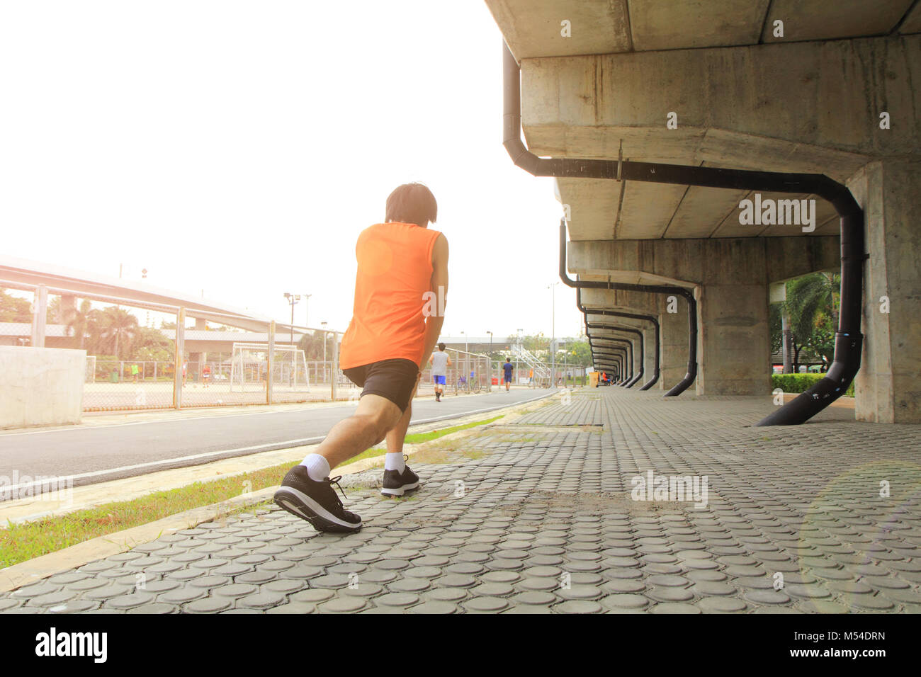 The man Stretching for running Stock Photo - Alamy