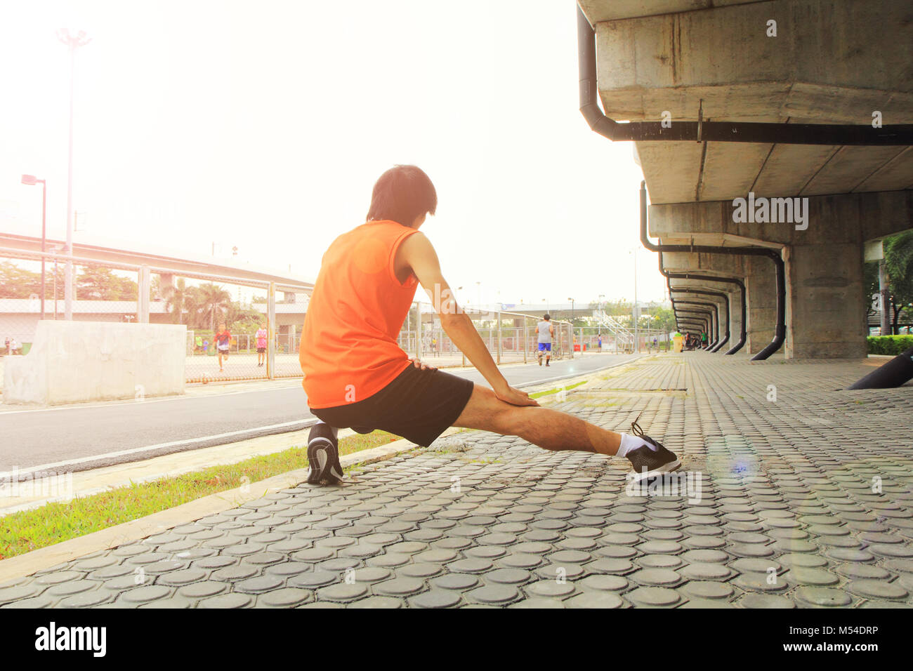 The man Stretching for running Stock Photo - Alamy
