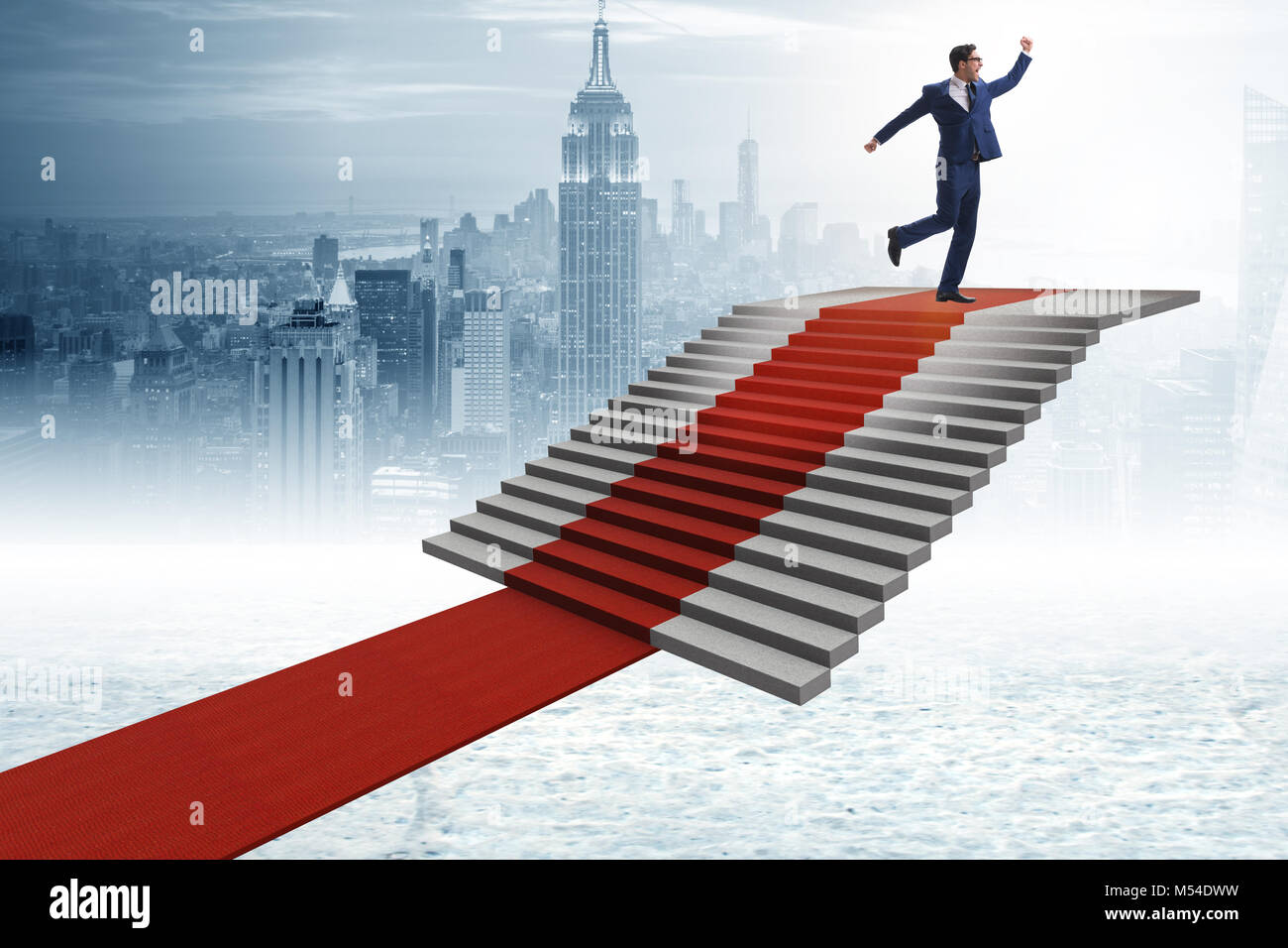 Young businessman climbing stairs and red carpet Stock Photo - Alamy