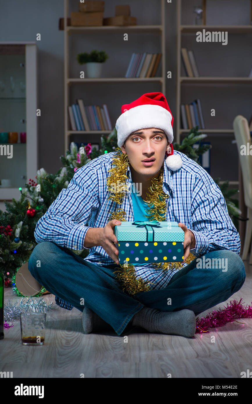 Man celebrating christmas at home alone Stock Photo - Alamy