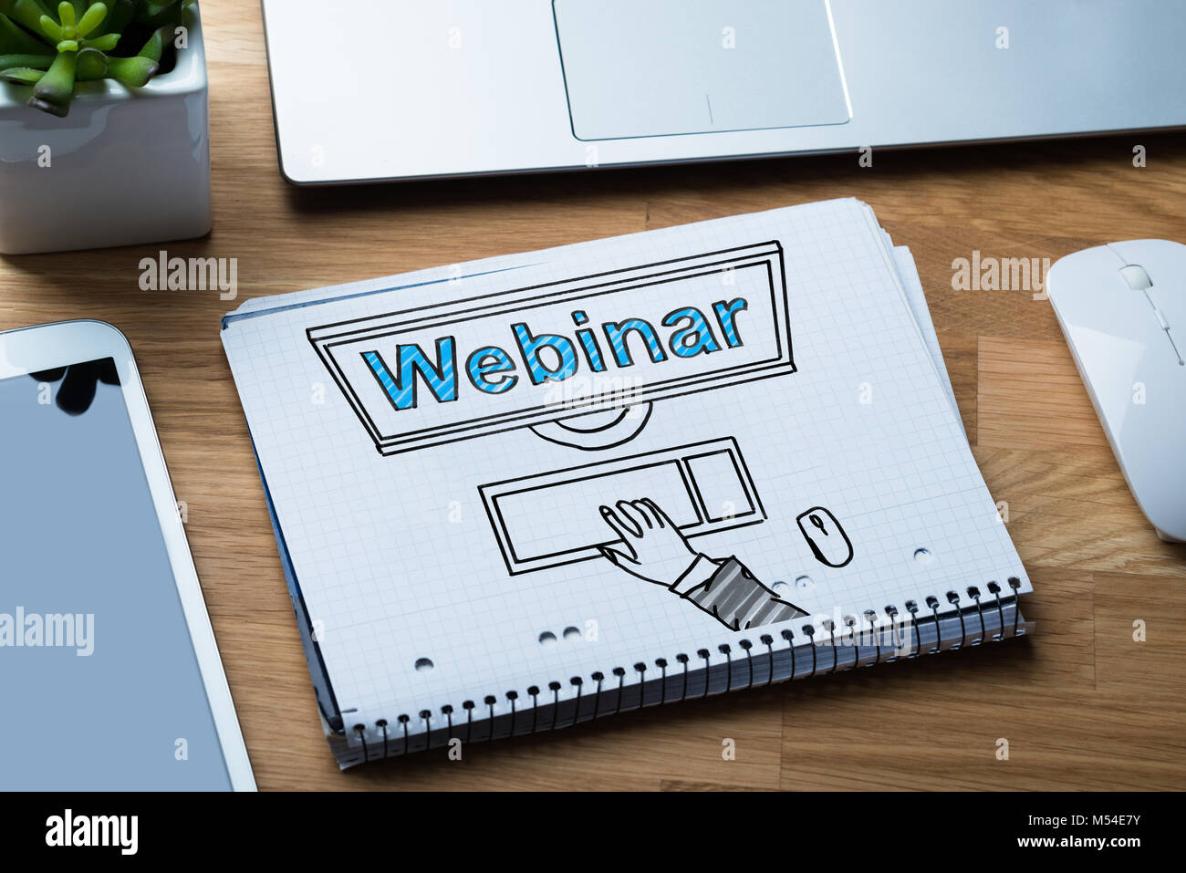 High Angle View Of Webinar Text On Book Page On Desk Stock Photo - Alamy