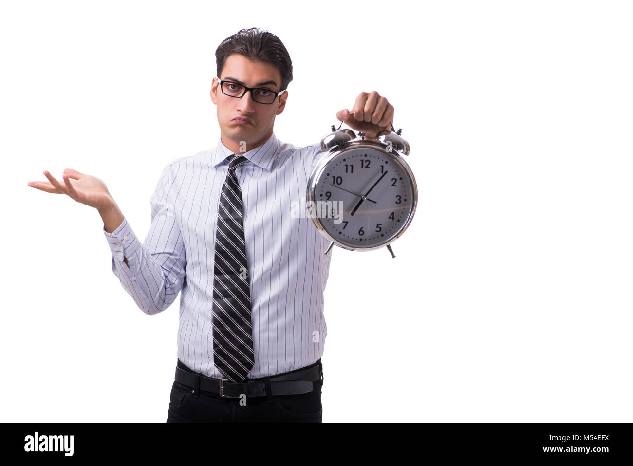 Young businessman in time management concept on white background Stock ...