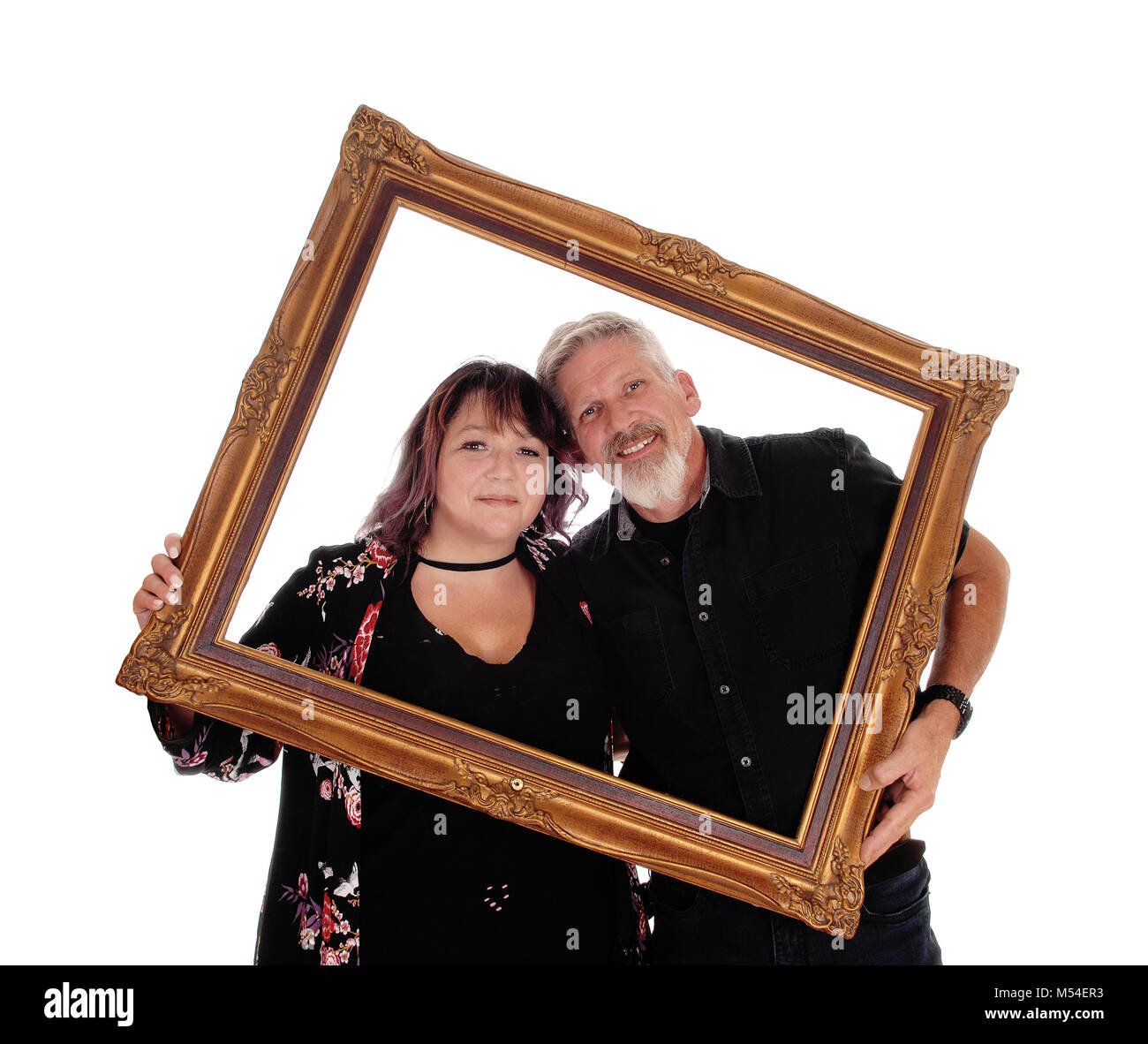 Happy couple in a picture frame Stock Photo - Alamy