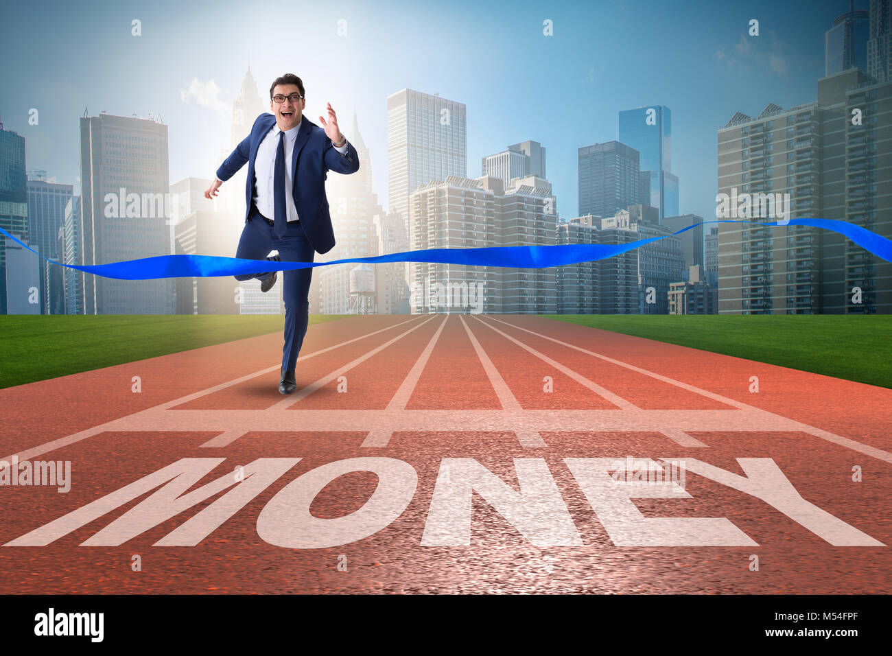 Businessman running towards money on track Stock Photo - Alamy