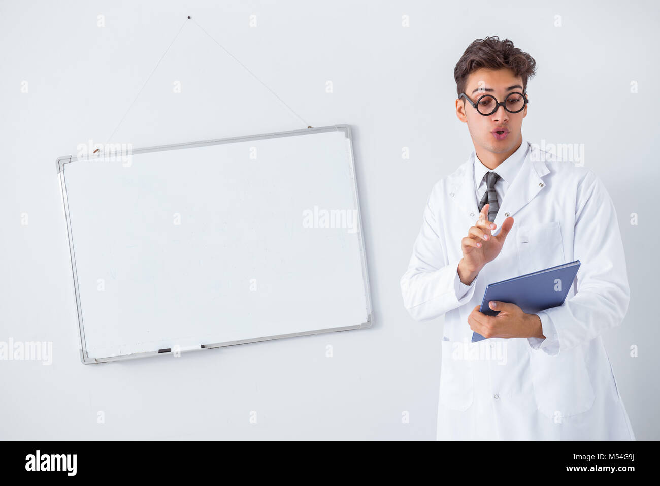 Funny doctor scientist making presentation in hospital Stock Photo - Alamy