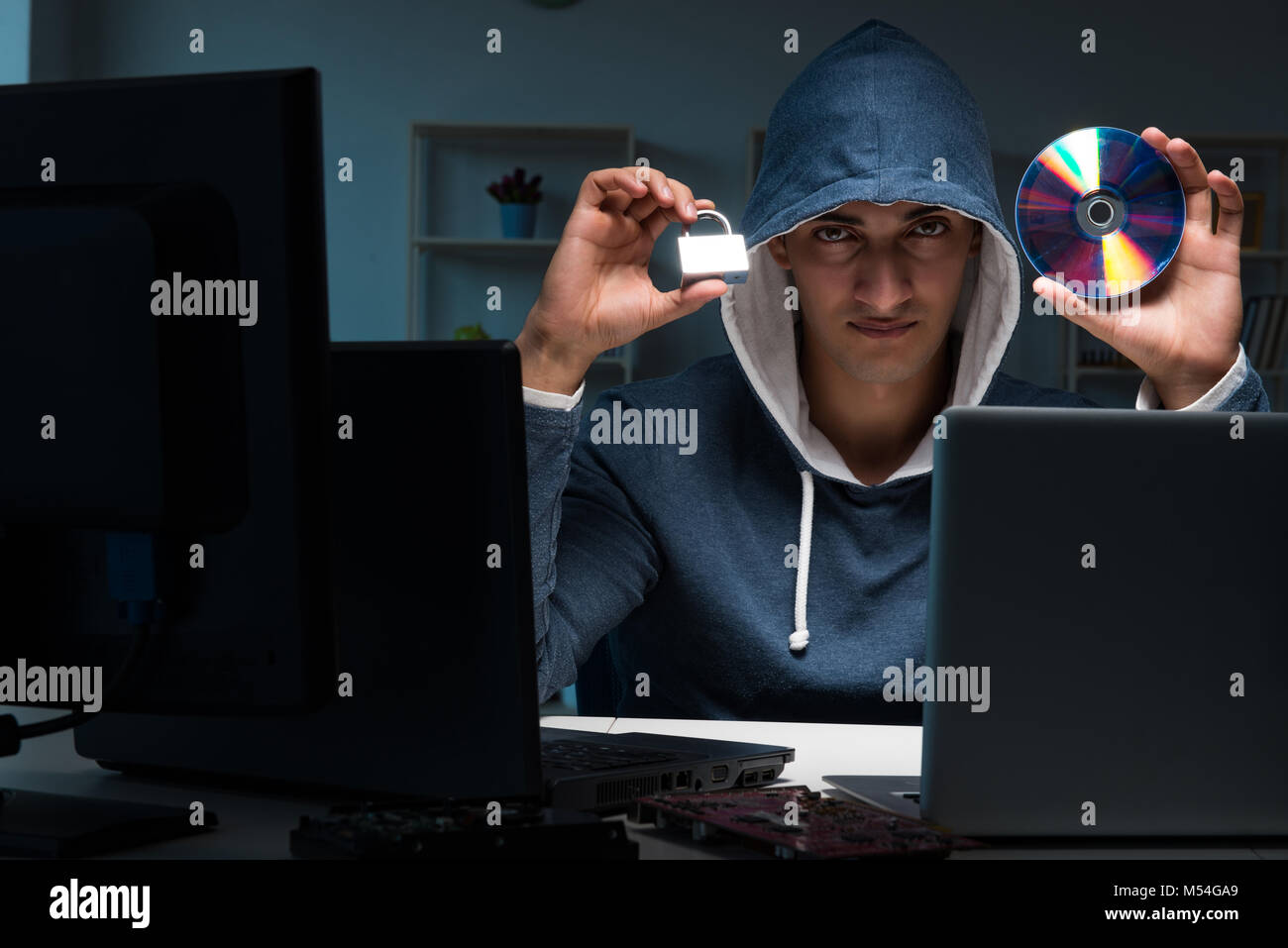 Hacker hacking computer at night Stock Photo - Alamy