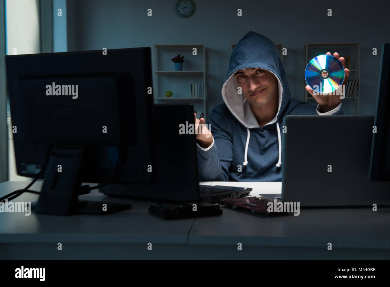 Hacker hacking computer at night Stock Photo - Alamy