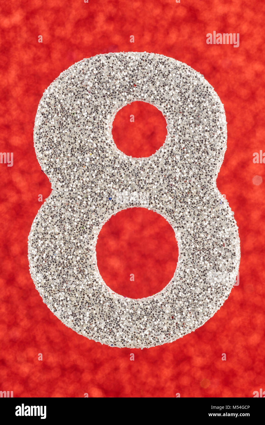 Number eight silver color over a red background. Anniversary. Vertical ...