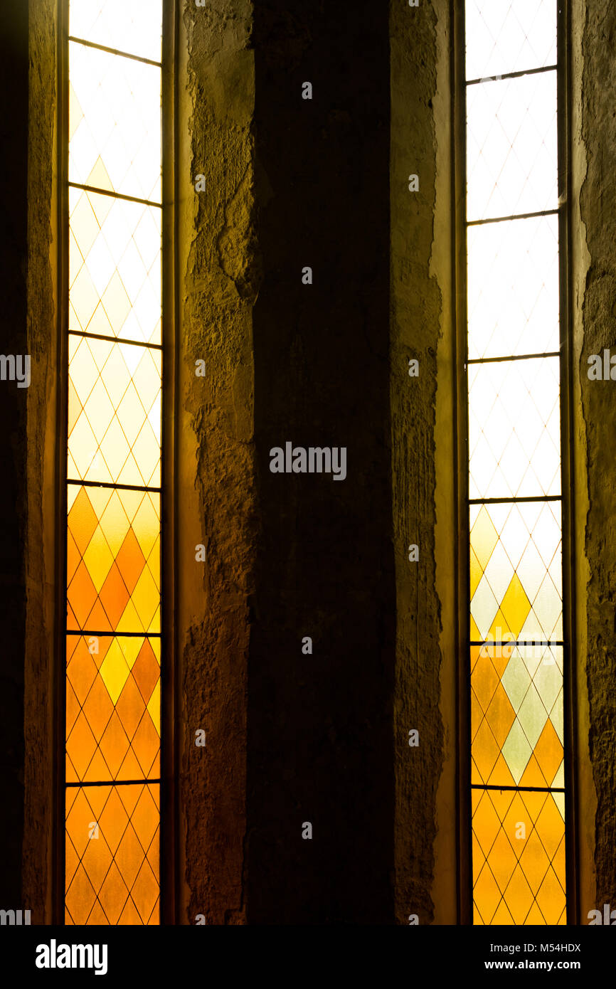 Yellow stained glass church windows Stock Photo - Alamy
