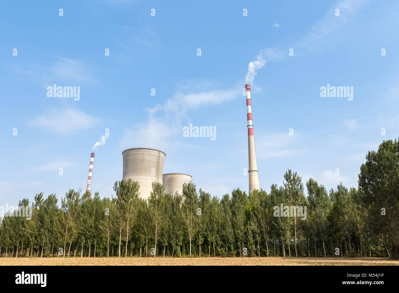thermal power plant and trees Stock Photo - Alamy