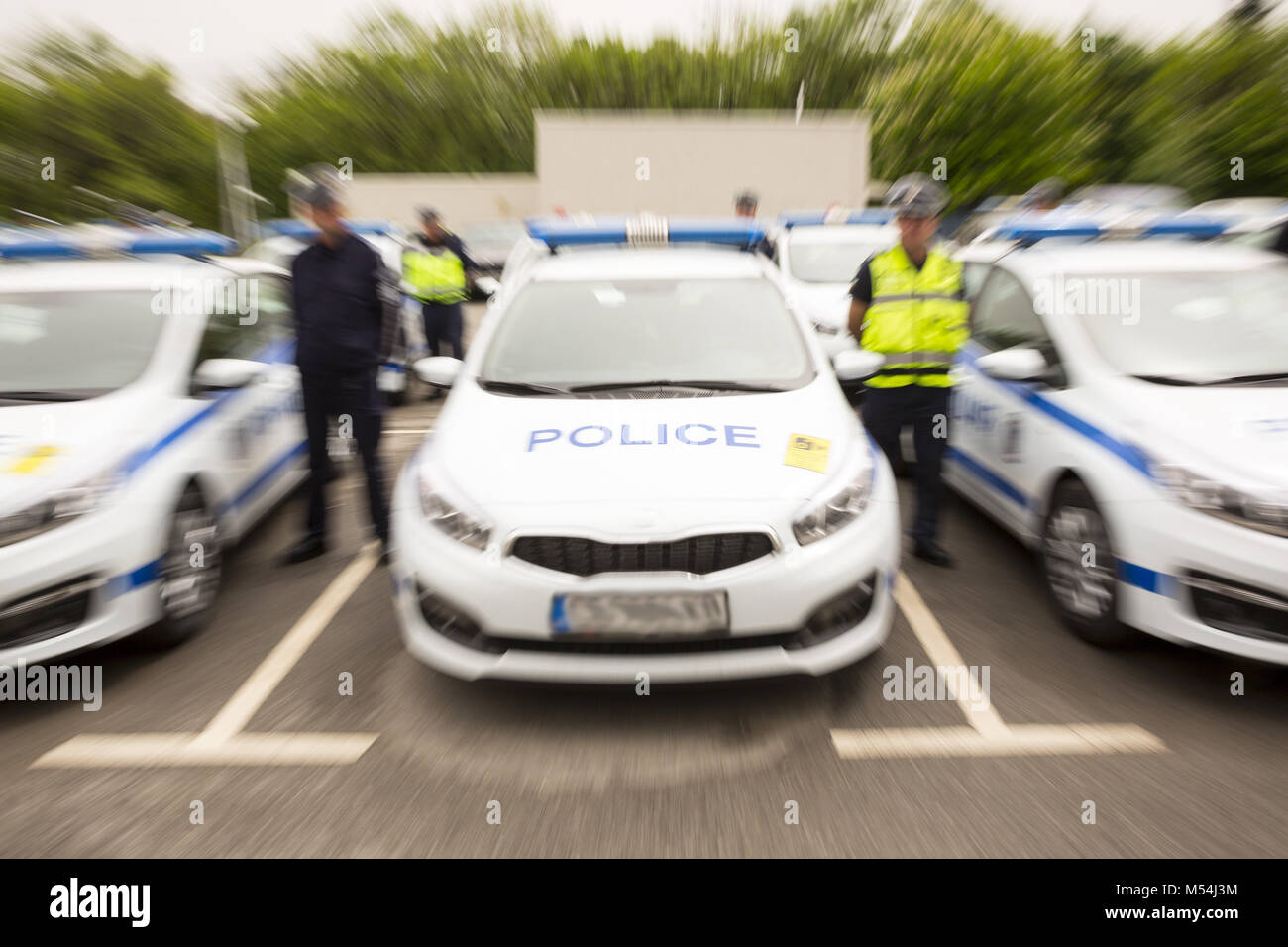 Police officers cars Stock Photo - Alamy