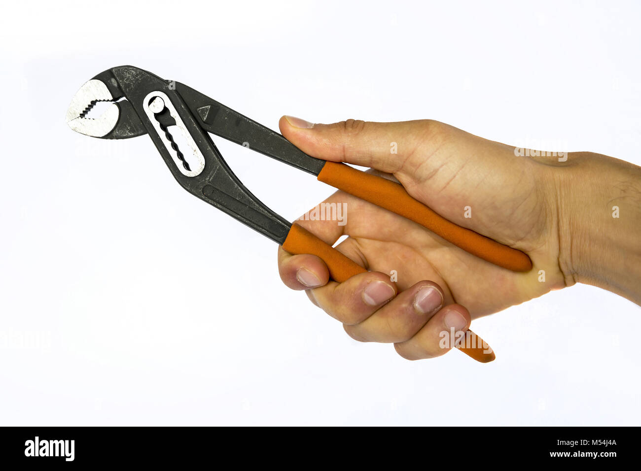 Adjustable pliers in human hand Stock Photo - Alamy