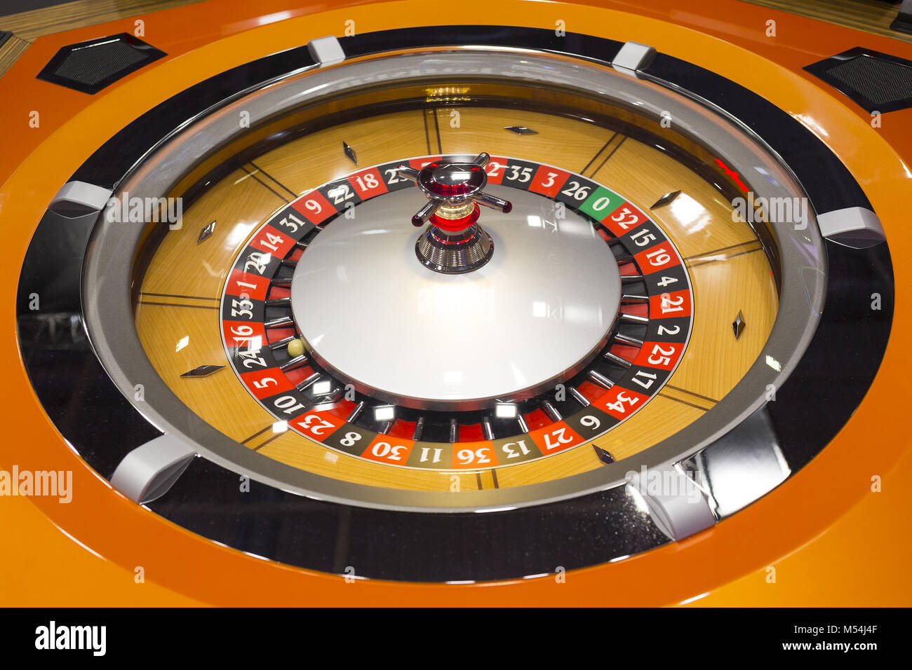 Roulette table in casino wooden Stock Photo - Alamy