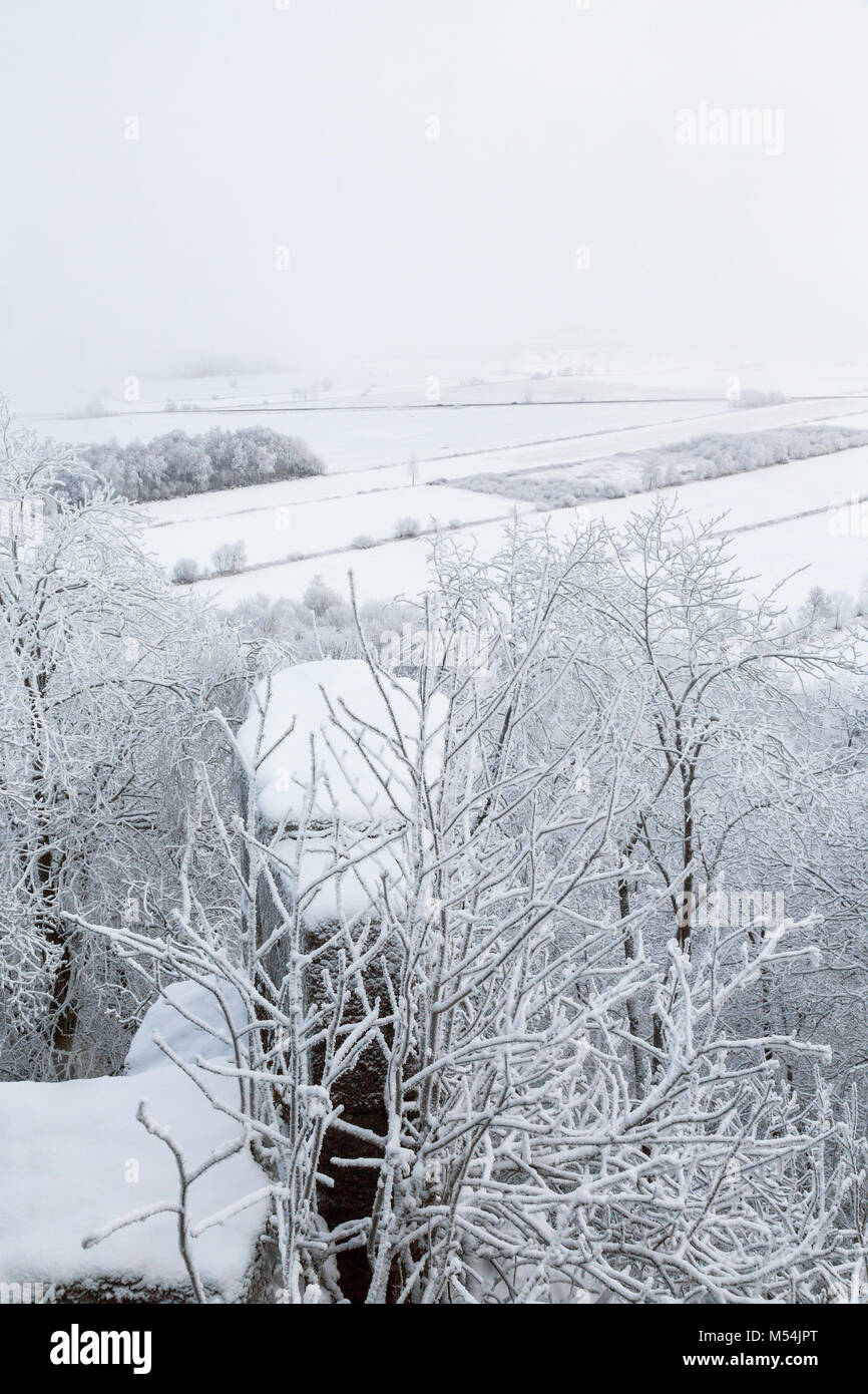 Cliff with view of the winter landscape Stock Photo - Alamy