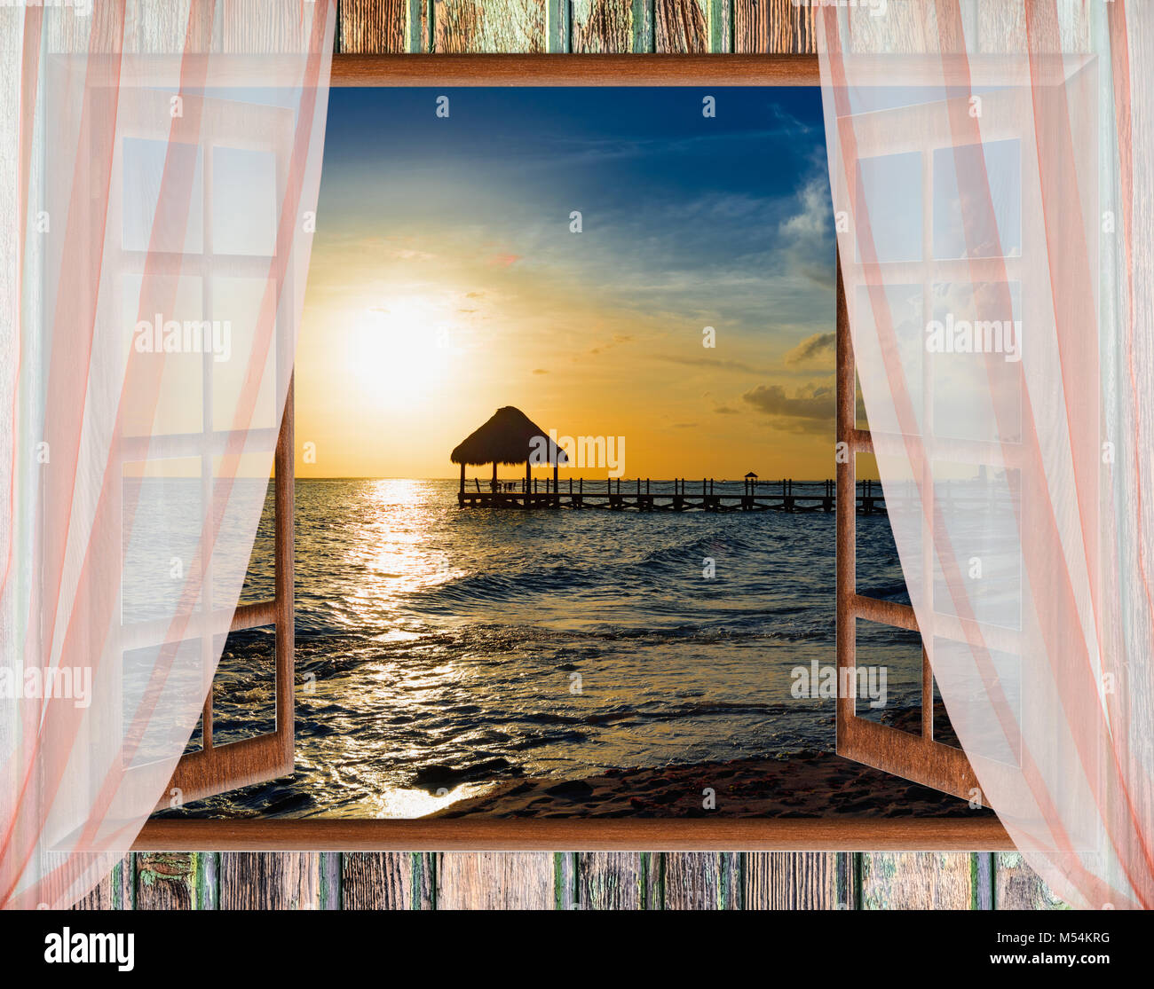 view from the open window of the caribbean sunset Stock Photo - Alamy