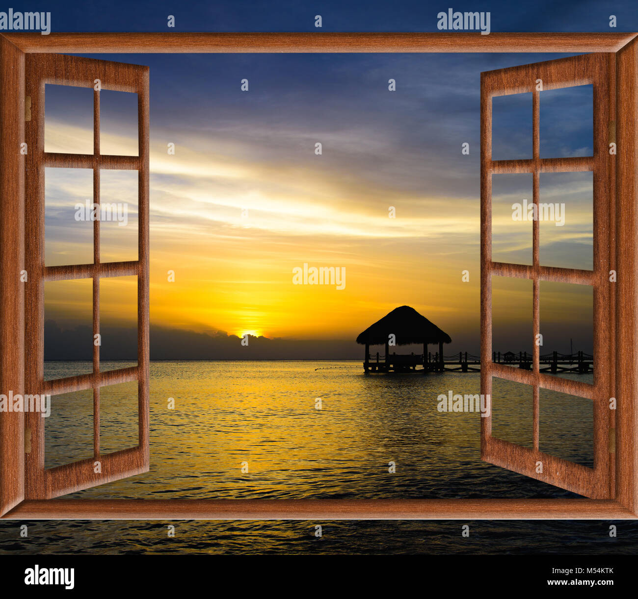 view from the open window of the caribbean sunset Stock Photo - Alamy