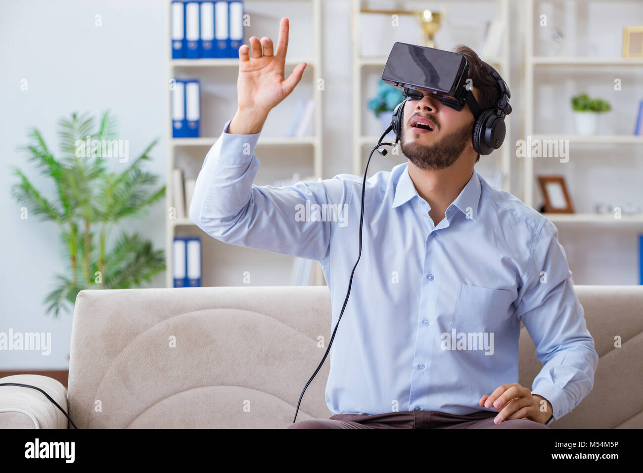 Student gamer playing games at home Stock Photo - Alamy