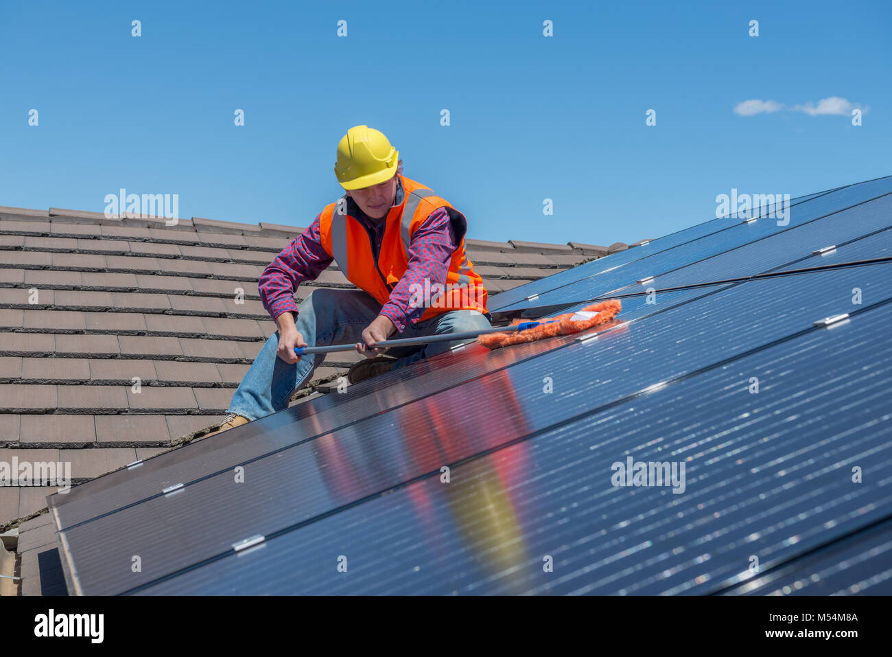 worker and solar panels Stock Photo - Alamy