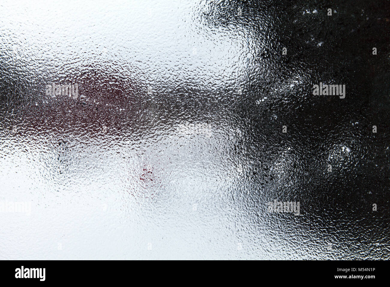 Freezing rain on a window. Silhouettes, shapes of what´s outdoors Stock ...