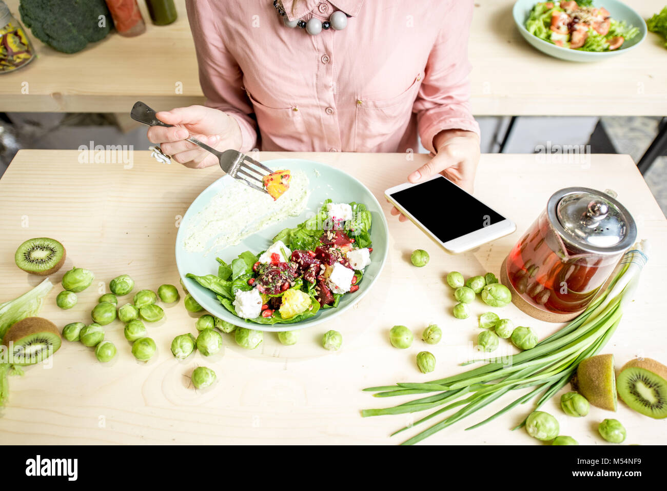 Woman eating sprouts hi-res stock photography and images - Alamy