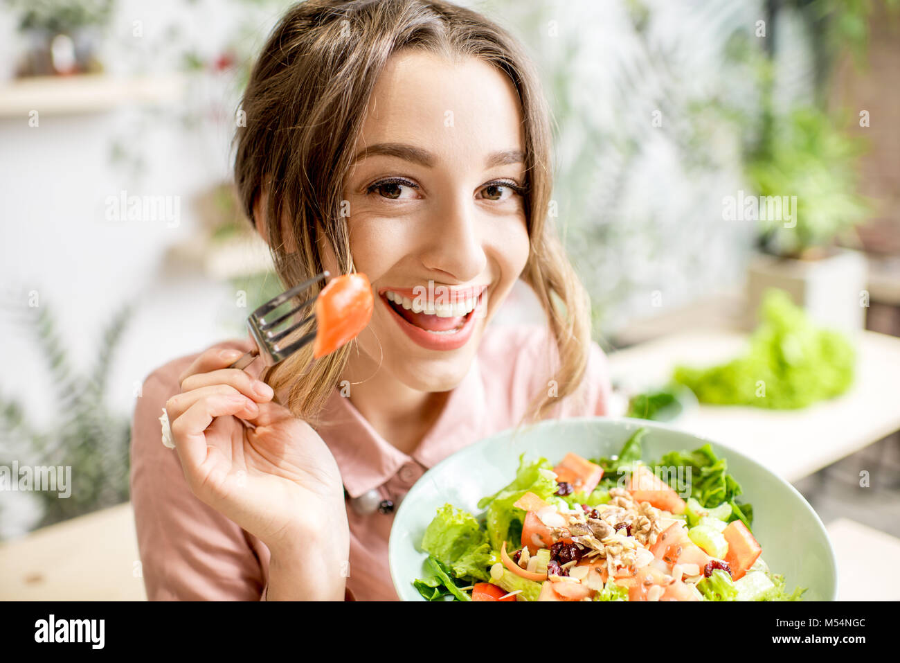 Woman eating healthy food close up hi-res stock photography and images ...