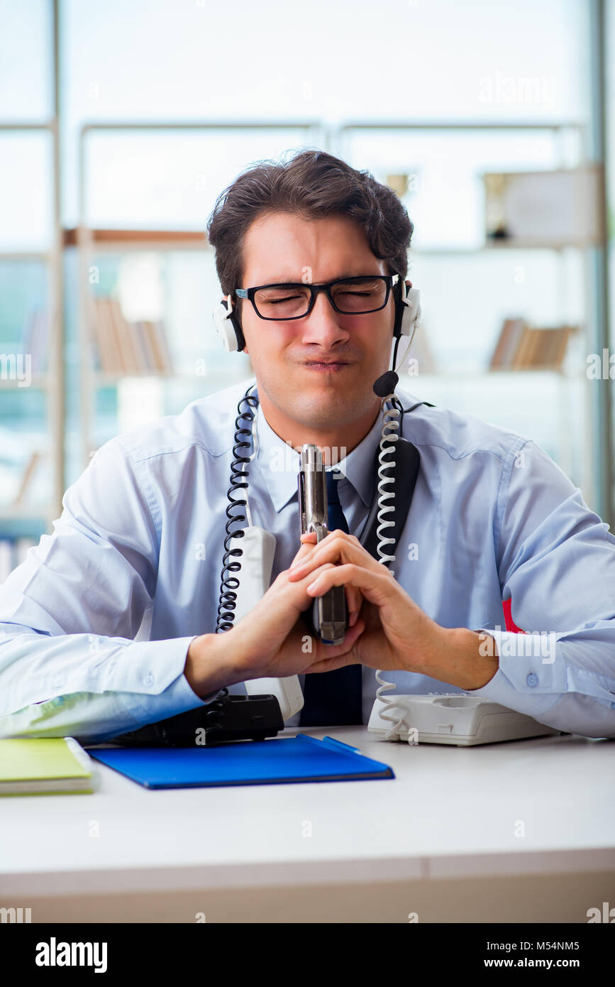 Unhappy angry call center worker frustrated with workload Stock Photo ...