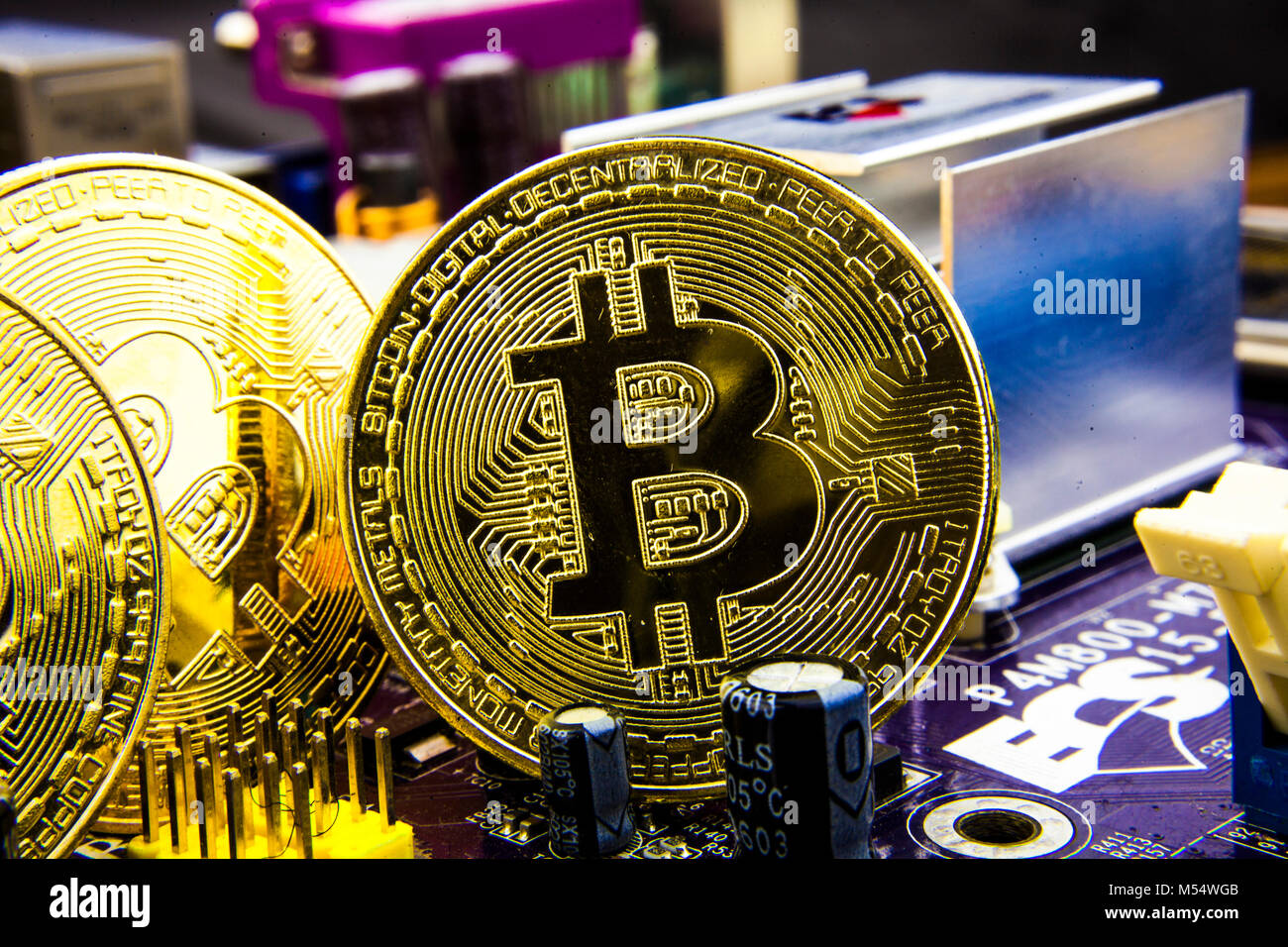 Cryptocurrency Bitcoin On The Motherboard. Gold Coin. Virtual Currency ...