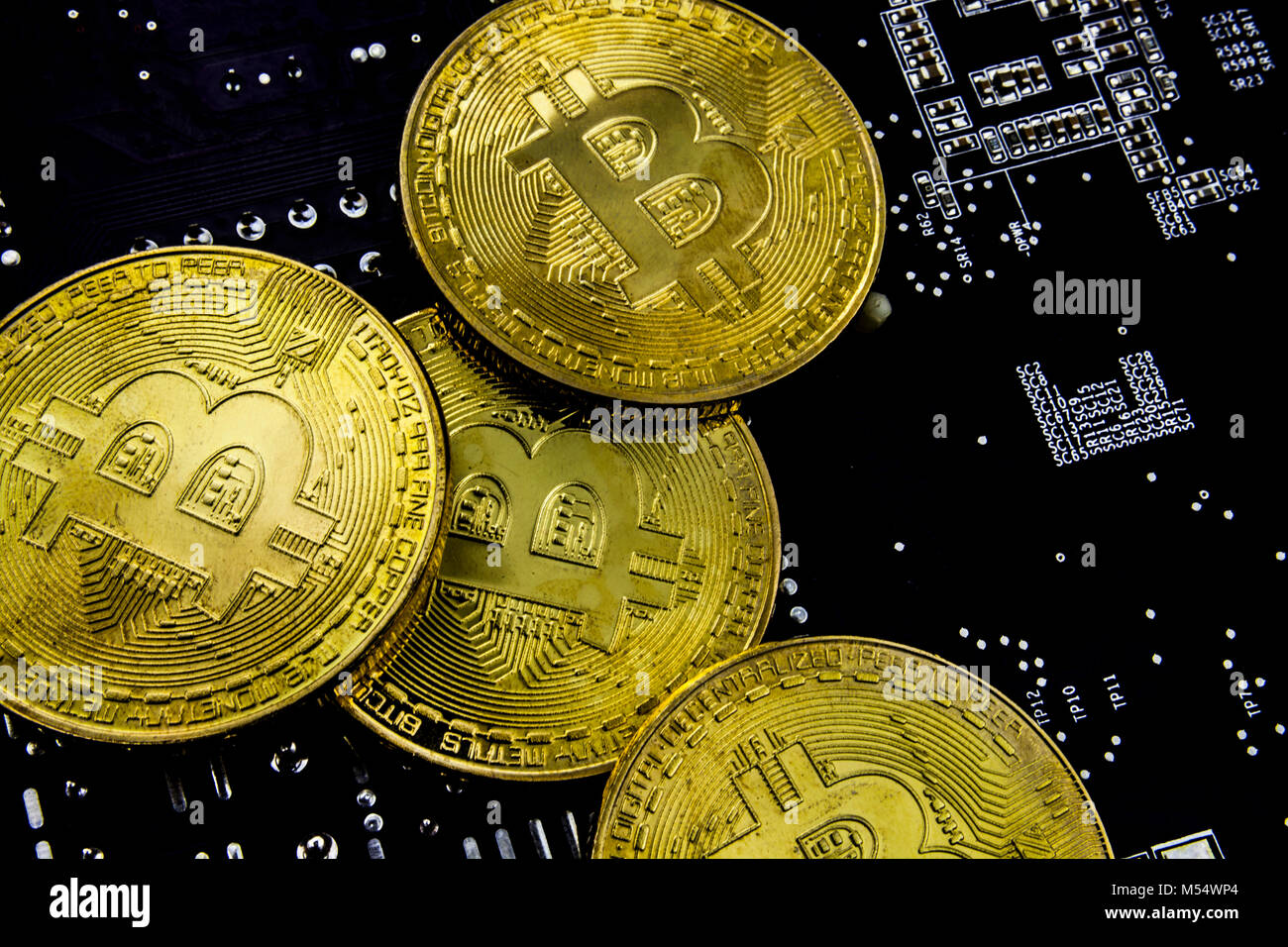 Cryptocurrency Bitcoin On The Motherboard. Gold Coin. Virtual Currency ...